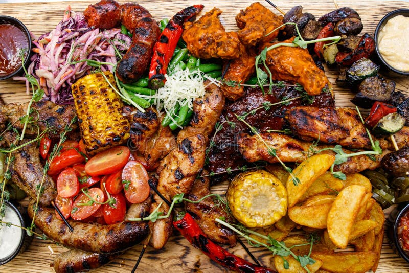 The Mix of Grilled Meat and Vegetables. Plate of Mixed Meat Stock Image ...