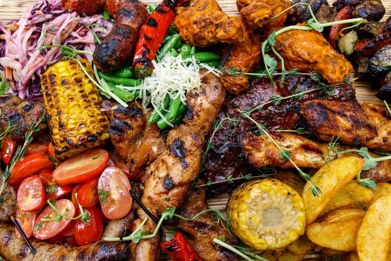 The Mix of Grilled Meat and Vegetables. Plate of Mixed Meat Stock Image ...