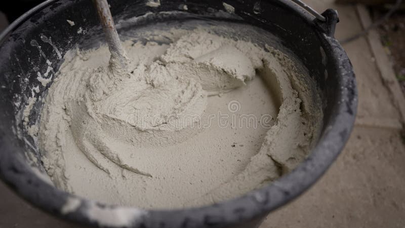 Bricklayer Grouting the Tiles of the Floor with a Strowel Stock Footage ...