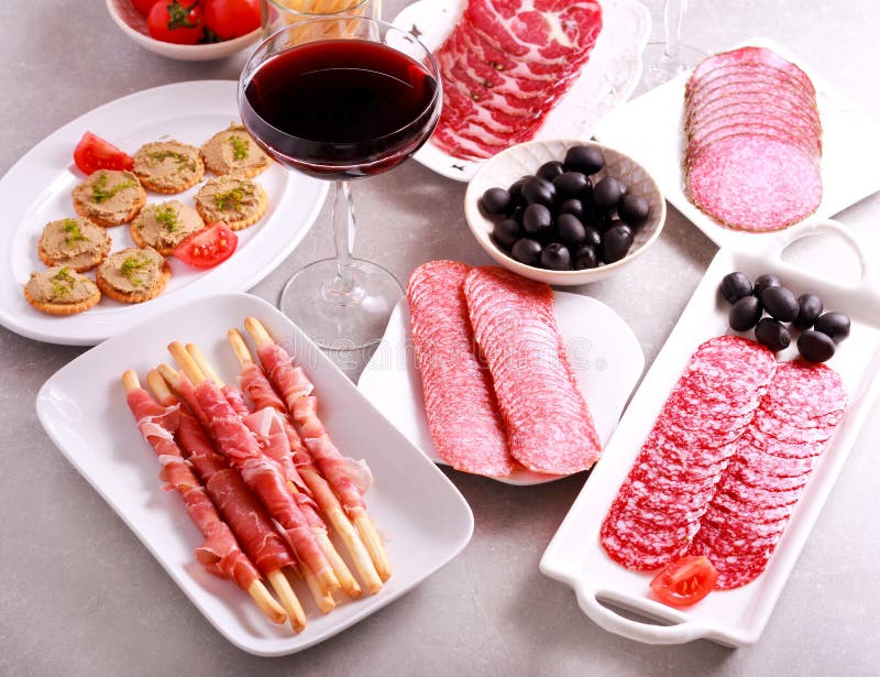Mix of Meat Products and Appetizers Served Stock Photo - Image of black ...