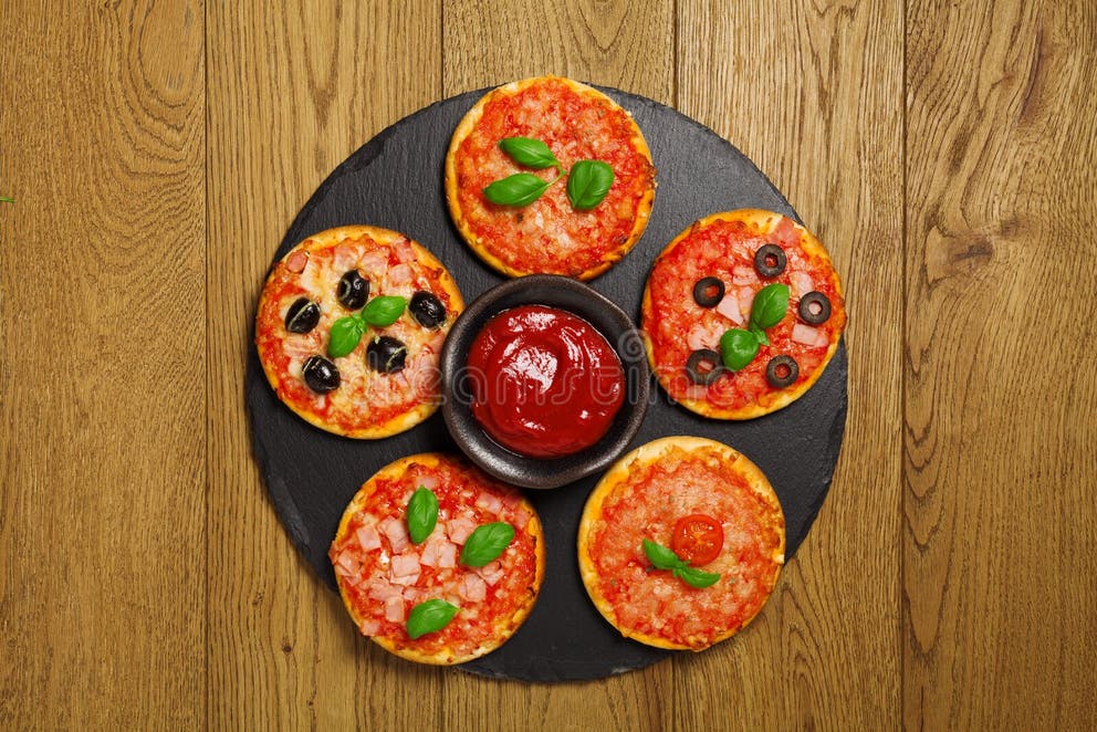 Mix of Mini Pizzas on a Stone Try Stock Photo - Image of food, studio ...