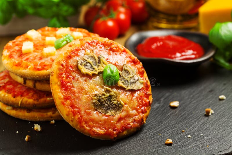 Mix of Mini Pizzas on a Stone Try Stock Photo - Image of studio ...