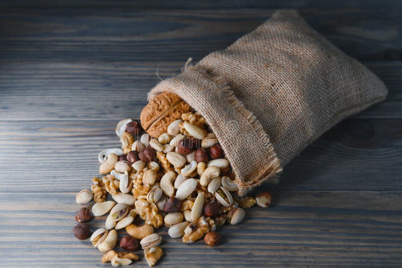 A Mix of Nuts in a Craft Bag Stock Photo - Image of nuts, sweet: 274162232