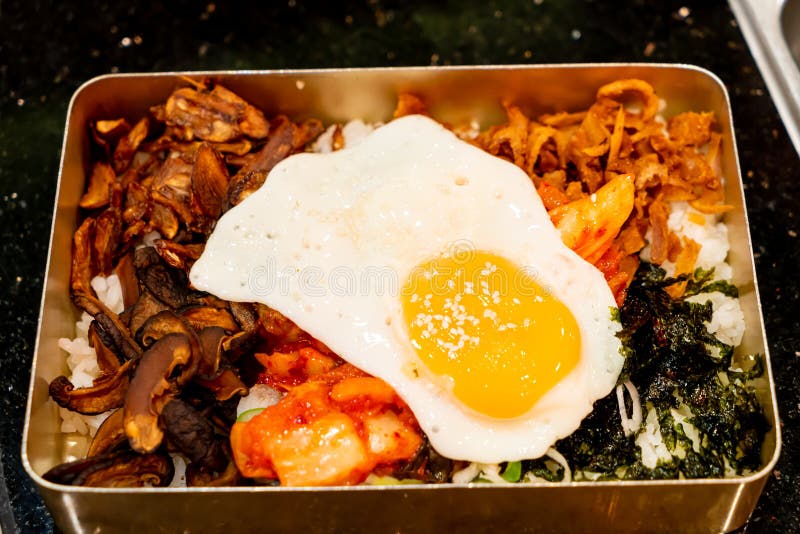 Mix rice with fried egg stock photo. Image of dish, cooking - 159750098