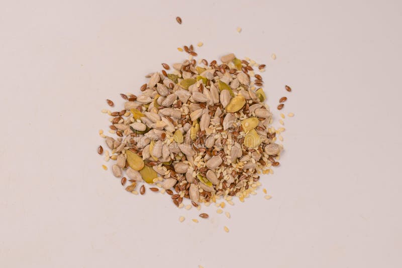 Mix of Seeds for a Salad. a Pile of Mixed Seeds Isolated on White ...