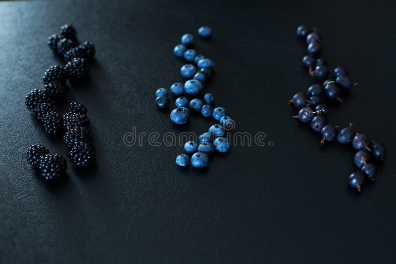 Mix Set Layout of Different Types of Black Berries on a Black Table ...
