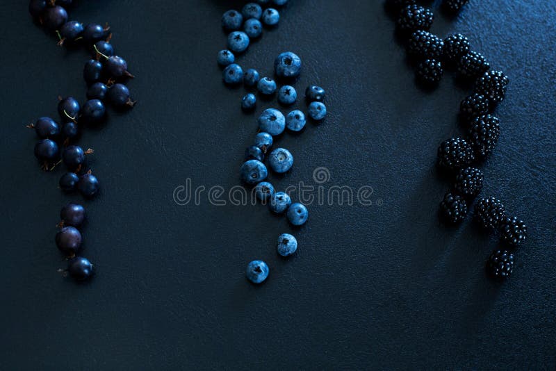 Mix Set Layout of Different Types of Black Berries on a Black Table ...