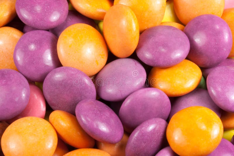 Purple Candy Covered Chocolates Stock Photo - Image of purple, flavored ...