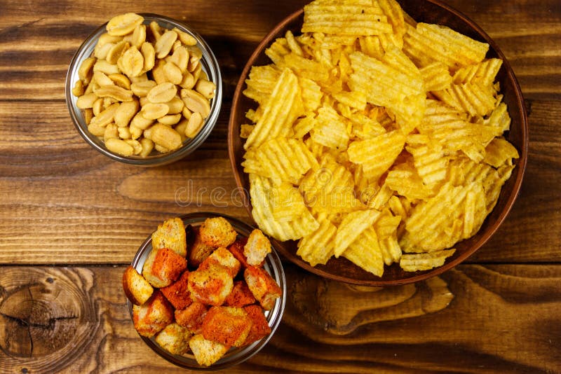 Mix of Snacks for Beer on Wooden Table Stock Image - Image of board ...