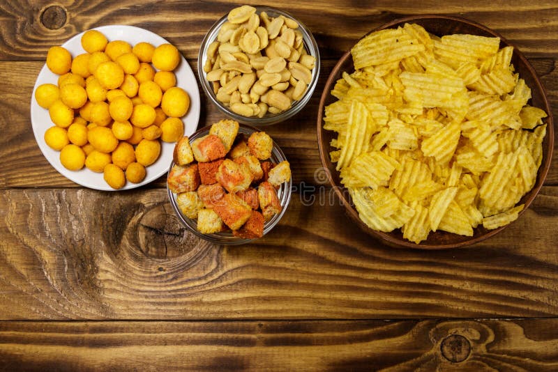 Mix of Snacks for Beer on Wooden Table Stock Photo - Image of delicious ...