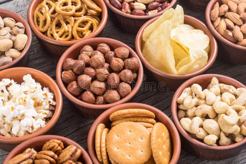 Mix of snacks stock image. Image of bowls, pretzels - 104946641