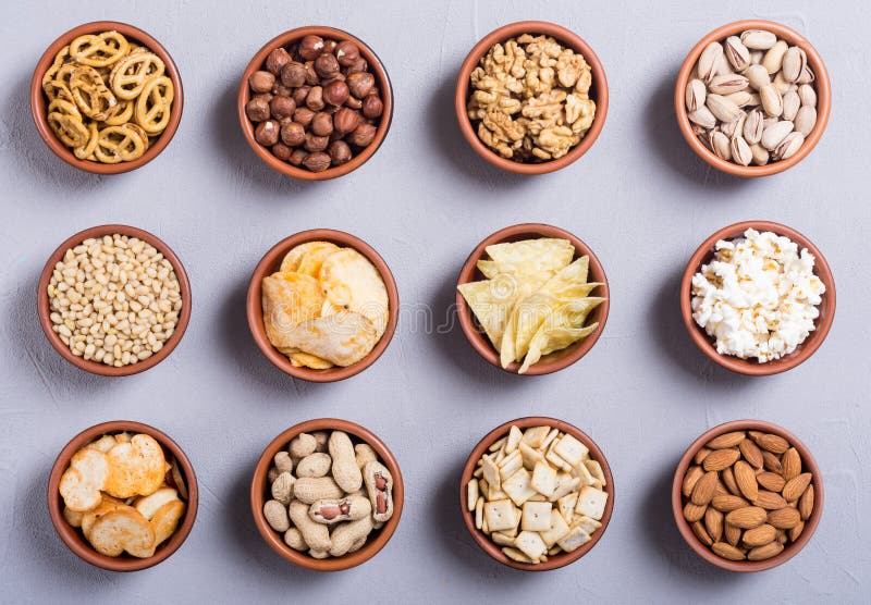 Mix of snacks stock photo. Image of bowls, overhead - 132009936