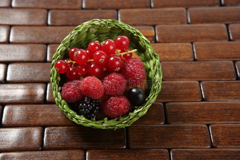 Mixed Berries in a Green Little Basket Stock Image - Image of closeup ...