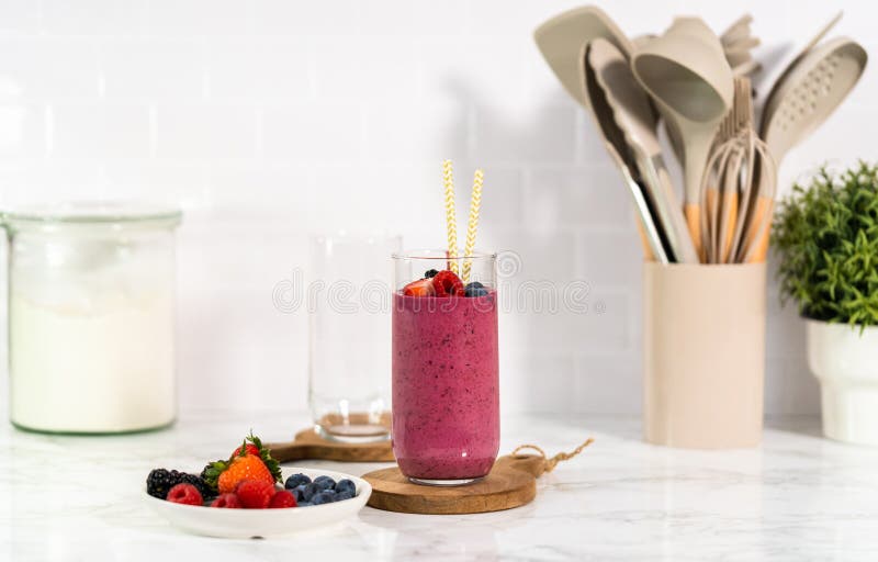 Mixed berry smoothie stock image. Image of straw, garnishes - 275782755