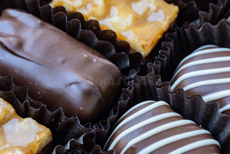 Mixed candies in the box stock photo. Image of stripped - 126027402