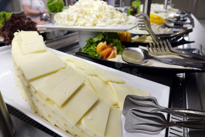 Mixed Cheeses in the Cupboard .Cheese Platter with Vegetables . Stock ...