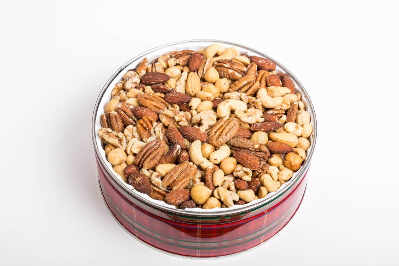 Mixed Deluxe Nuts in a Red Gift Tin Stock Image - Image of almond ...
