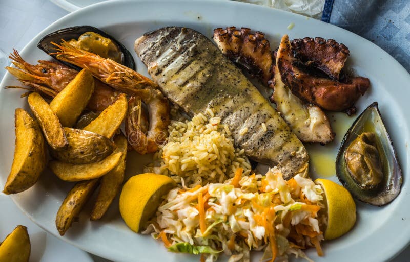 Mixed Dish of Fish and Seafood on Oval Plate Stock Image - Image of ...