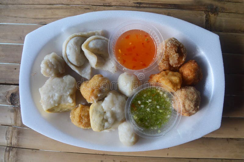 Mixed Fish Dumplings, Fish Ball on Dish with Sauce Stock Photo - Image ...