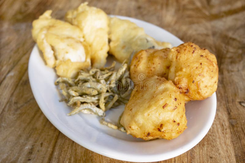 Mixed fried fish stock image. Image of anchovies, plate - 240859809