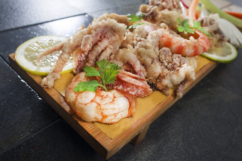 Mixed fried fish stock image. Image of lemon, cook, fish - 109322351