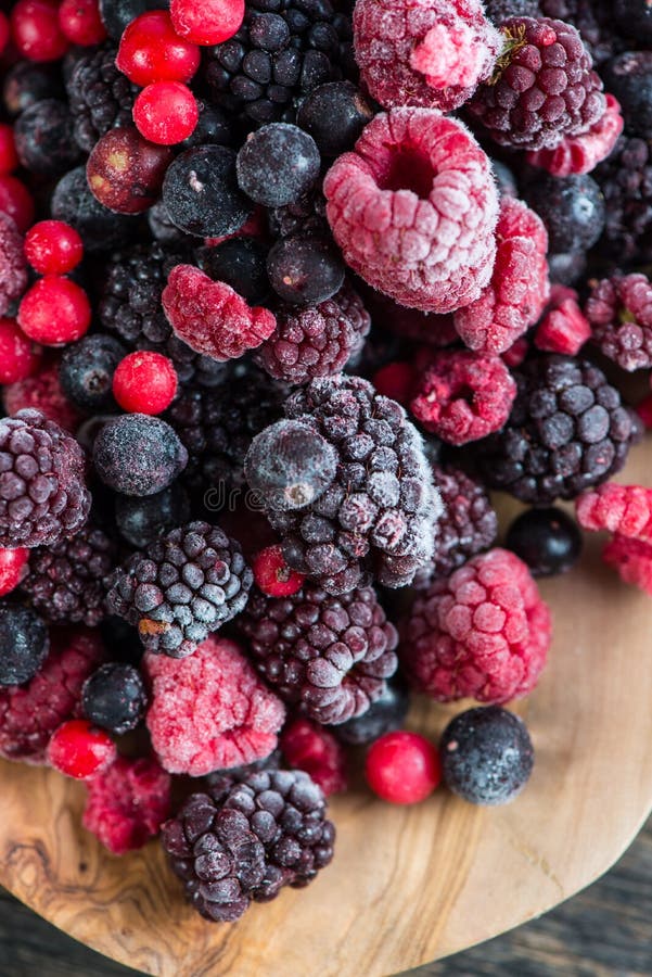 Mixed Frozen Berries on Wooden Background Stock Photo - Image of cold ...