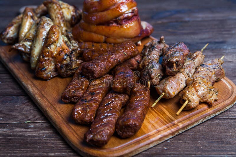 Mixed Grilled Meat Platter. Assorted Delicious Grilled Meat Stock Photo ...