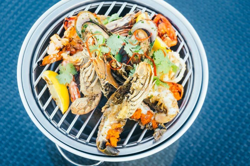 Mixed grilled seafood stock photo. Image of gourmet - 100887104