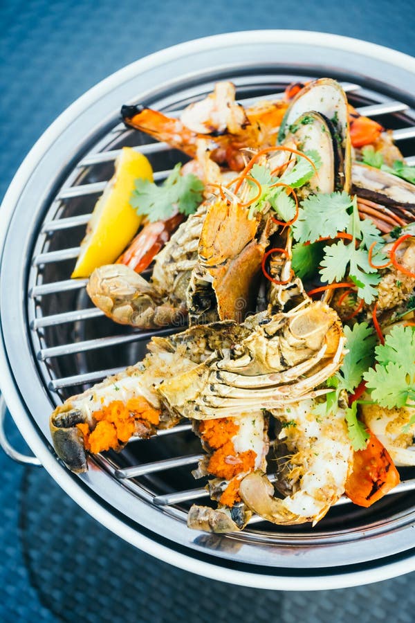 Mixed grilled seafood stock image. Image of dish, restaurant - 101010311
