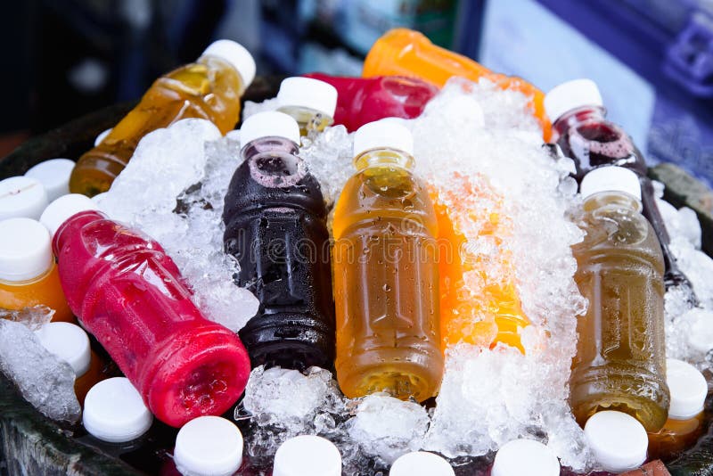 Mixed Ice Cold Juice Bottle Stock Photo - Image of carbonated, fizzy ...