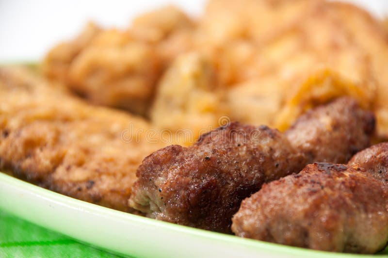 Mixed meat on a plate stock photo. Image of arranged - 51184804