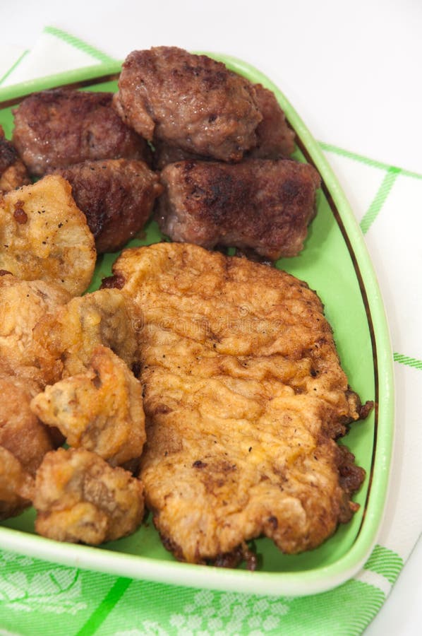 Mixed meat on a plate stock photo. Image of arranged - 51184804