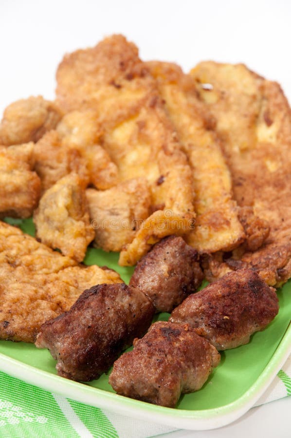 Mixed meat on a plate stock photo. Image of arranged - 51184804