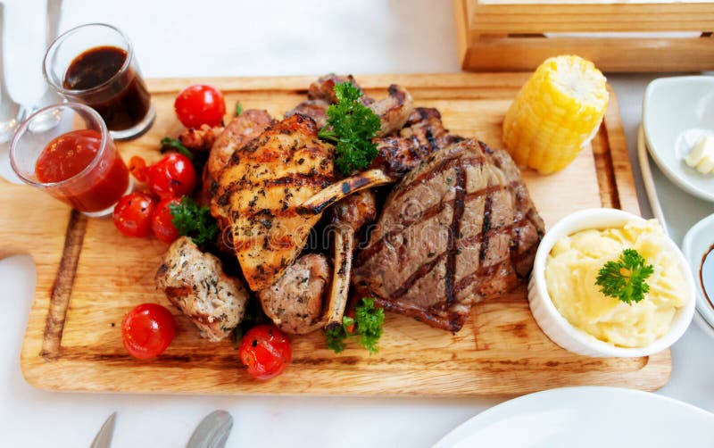 Mixed meat on a plate stock photo. Image of arranged - 51184804