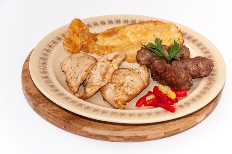 Mixed meat on a plate stock photo. Image of arranged - 51184804