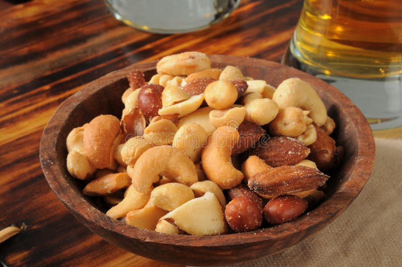 Mixed nuts and beer stock photo. Image of bowl, tall - 34788744