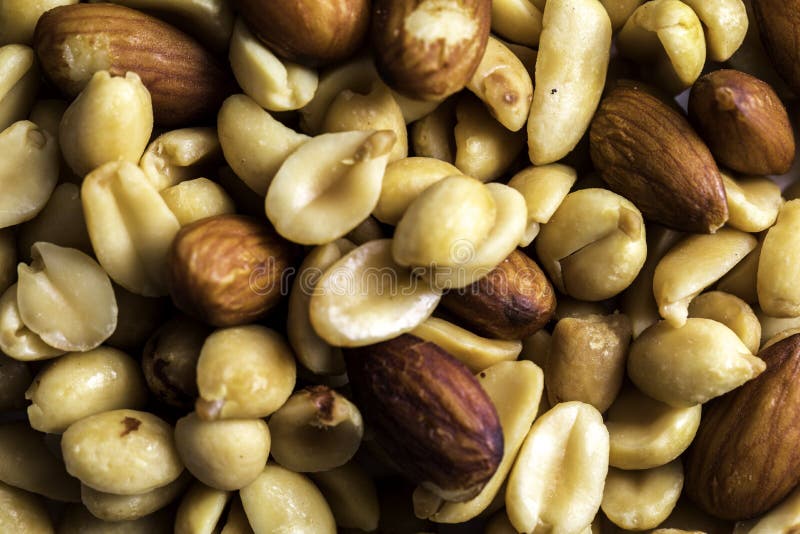 Mixed Nuts Peanuts Almonds stock image. Image of macro - 110112843