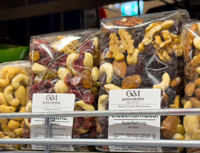 Mixed Nuts and Dried Fruits in Packaging on Store Shelf Editorial ...
