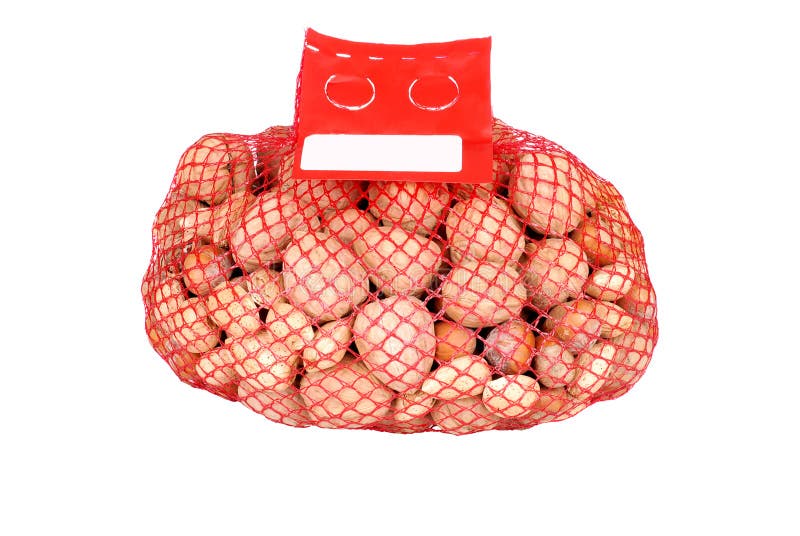 Mixed nuts in a mesh bag stock photo. Image of isolated - 22637670