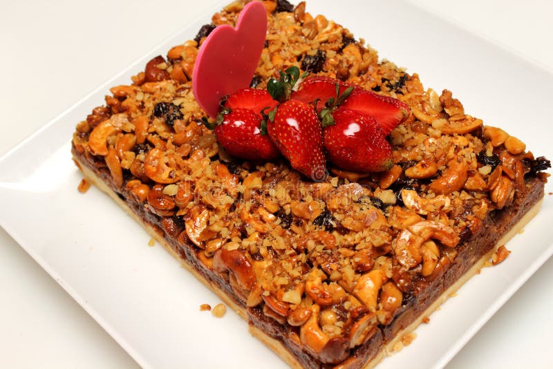 Mixed Nuts Pie Decorated with Strawberry. Stock Photo - Image of ...