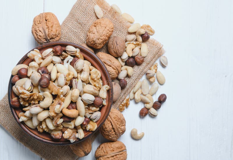 Mixed Nuts on a Plate. White Background Stock Image - Image of nuts ...