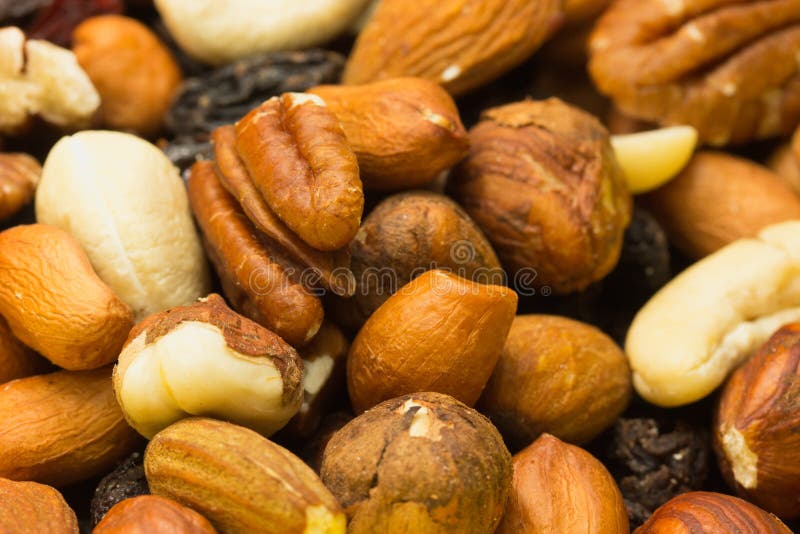 Mixed nuts with raisins. stock photo. Image of macro - 25087756