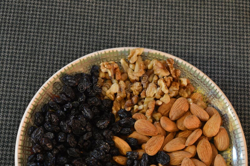 Mixed nuts and raisins stock image. Image of healthy - 181947507