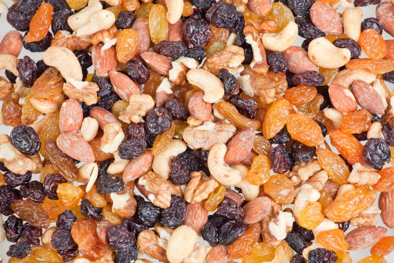 Mixed nuts and raisins stock photo. Image of nutritious - 34985618