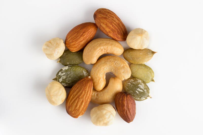 Mixed Nuts And Seeds On White Background Close Up Stock Photo - Image ...