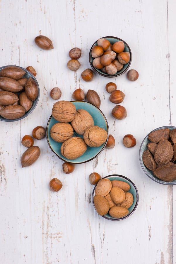 Mixed Nuts on a White Textured Background Stock Photo - Image of brown ...