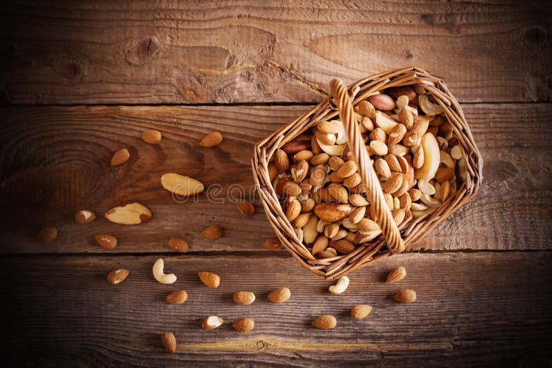 Mixed Nuts on Wooden Background Stock Photo - Image of variation ...