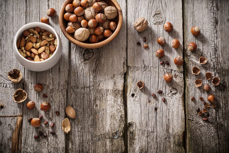 Mixed Nuts on Wooden Background Stock Image - Image of food, collection ...