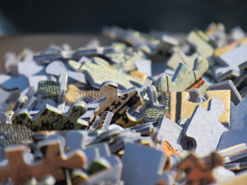 Mixed Puzzle Pieces in a Box Stock Photo - Image of mixed, little ...