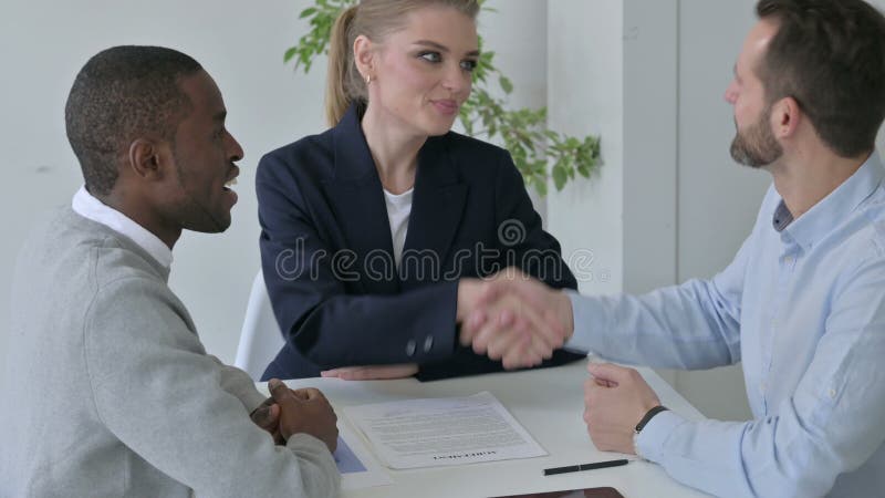 Mixed Race Business People Shaking Hands in Office Stock Footage ...